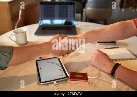 Traders analyze stock market trends with charts and graphs during ...