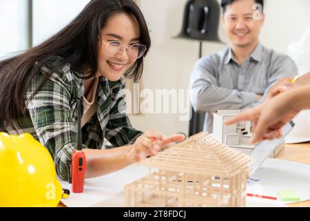The collaborative work of a group of architects inspecting the ...