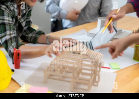 The collaborative work of a group of architects inspecting the ...