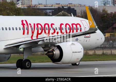 Pegasus Airlines Airbus A320 NEO taxiing after landing at Lviv Airport with US Air Force C5 ...