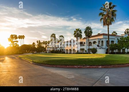 This image depicts a luxurious two-story residence situated on a ...