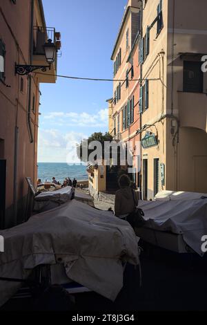 Genova, Italy - November 2023 - Street with parked cars by its edge ...