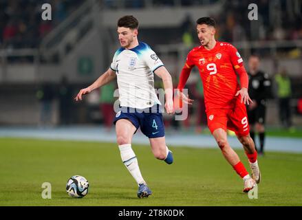 20, Bojan Miovski of North Macedonia plays the ball past 22, Josh ...