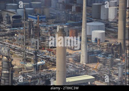Aerial photograph of the flare stacks of Fawley refinery on the edge of ...