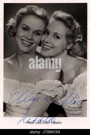 Kessler Twins ALICE KESSLER and ELLEN KESSLER young play on a see saw ...