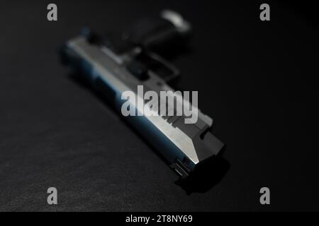 Elegant Chrome Handgun on Gray Granite Background in Switzerland Stock ...