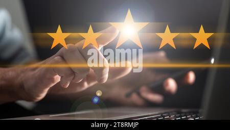 Please rate us banner wtih customer hand give five golden stars Stock ...