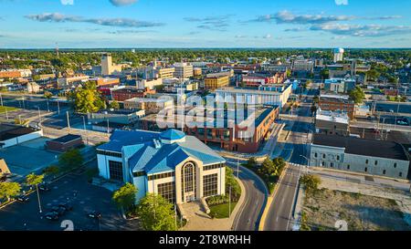 City of Muncie building aerial at sunset with gorgeous blue sky and ...