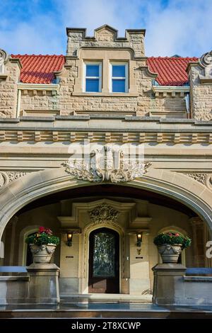 Entrance Minnetrista Museum and Gardens mansion building under cloudy ...