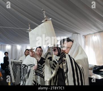 An ultra orthodox Jew shows a scroll with Hebrew alphabet for the ...