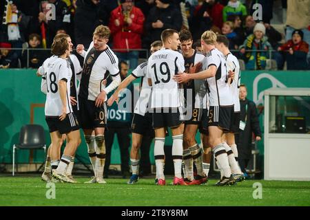 Germany's Merlin Rohl, right, celebrates with teammates after scoring ...
