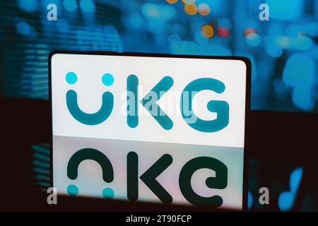 In this photo illustration, the UKG logo is displayed on a smartphone ...