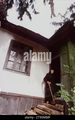 Valea Neagra Monastery, Vrancea County, Romania, 2000. Elderly nun ...
