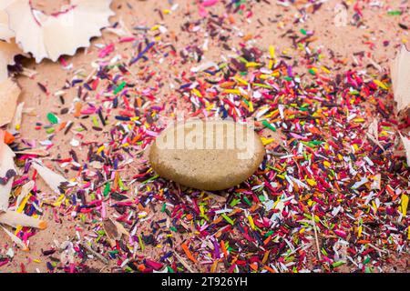 Little gold color stone on wooden background Stock Photo - Alamy