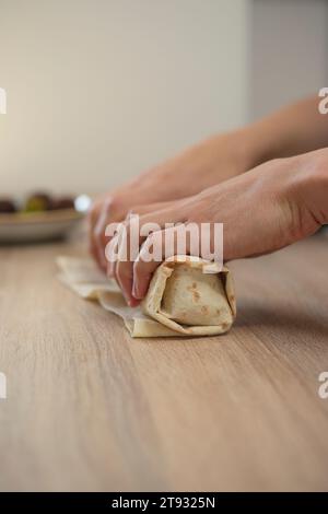 Man cooking homemade falafel in pita Stock Photo - Alamy