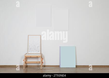 Room decorated with posters. Cosy interior design Stock Photo - Alamy