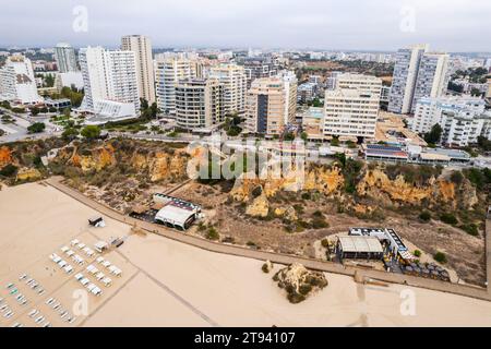Aerial drone view of Portimao skyline and city beach of Praia da Rocha ...