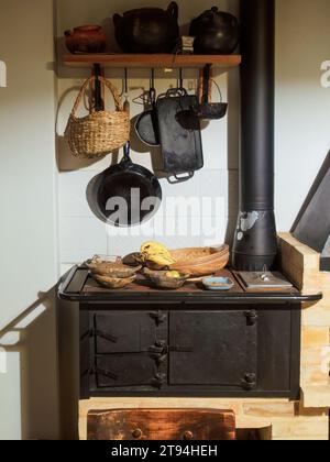 Old cast iron household central heating radiator in living room ...