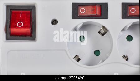Detail of multi sockets power extension Stock Photo - Alamy