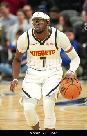 Denver Nuggets guard Reggie Jackson pushes past Miami Heat guard Terry ...