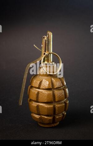 Hand grenade on a dark background Stock Photo - Alamy
