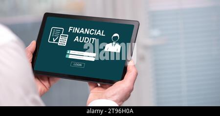 Tablet screen displaying a financial audit concept Stock Photo - Alamy