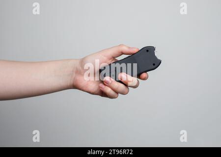 Taser isolated on white background. Taser isolated Stock Photo - Alamy
