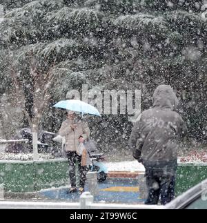 YANTAI, CHINA - NOVEMBER 24, 2023 - Vehicles travel through snow on the ...