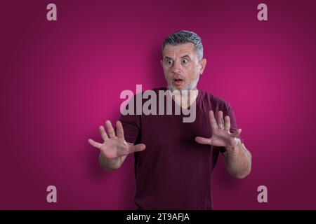 Scared and afraid man. Expressing the emotion of fear Stock Photo - Alamy