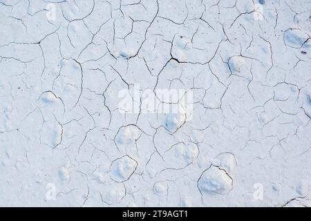 Brown color dry cracked muddy earth as a background texture Stock Photo ...
