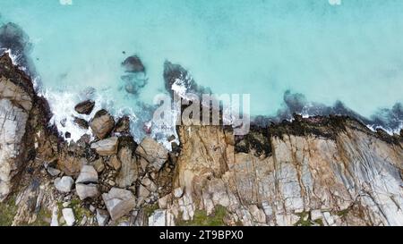 Cliff on the ocean in Arraial do Cabo, Brazil. Beautiful natural colors ...