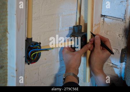 Constructing and installing electrical wiring with the brown phase, the ...