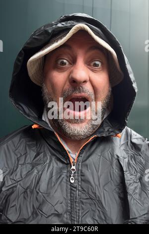 Facial expressions, portrait of angry fisherman Stock Photo - Alamy