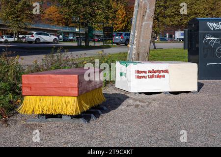 Street art sculpture of scrub brush or root brush in Merihaka district ...
