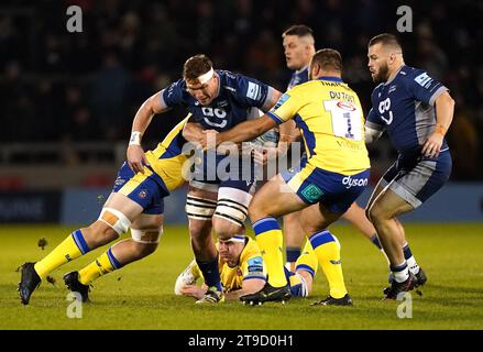 Bath's Thomas Du Toit is tackled during the Investec Champions Cup ...
