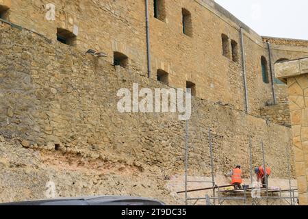 non edited picture of workers working on renewing and renovation of old ...