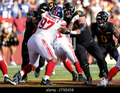 Washington Commanders center Tyler Larsen (69) blocks during an NFL ...