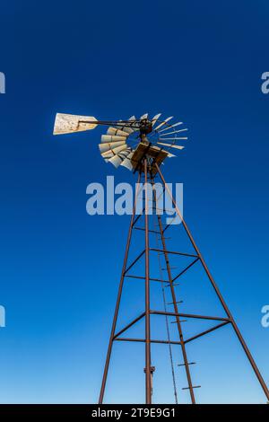Windmill pumping water for cattle on the range in Nebraska National ...