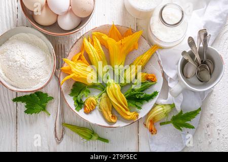Preparation for roasted pumpkin flower made of pancake batter. Deep ...