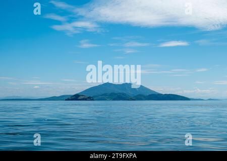 Tiny Islands Seen From Afar with Volcanic Mountains, Lush Vegetation ...