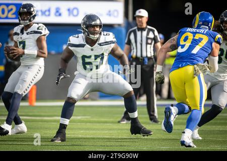 Seattle Seahawks offensive tackle Charles Cross (67) lines up with ...
