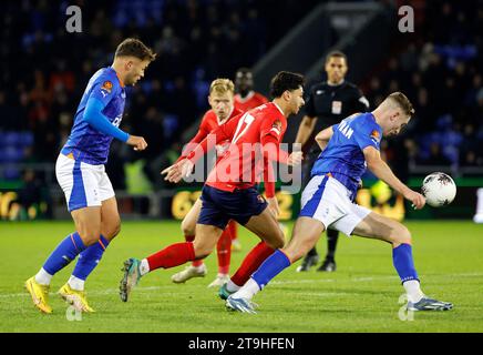 Josh Lundstram of Oldham Athletic Association Football Club is tussling ...
