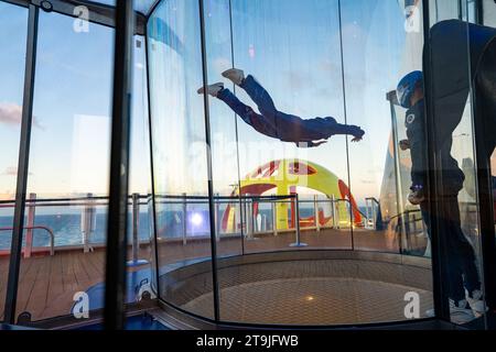 A guest enjpying the full experience of Ripcord by iFly in Odyssey of ...