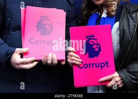Everton fans holding "Corrupt" signs outside the ground before the ...
