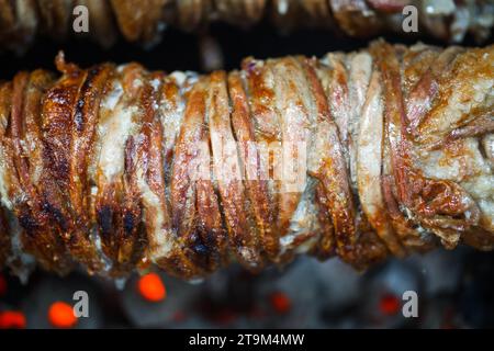 Kokorech, lamb intestines and giblets are cooked on spit, bokeh ...