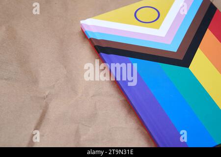 Notebook with the lgbtiq flag on a cardboard texture background Stock ...