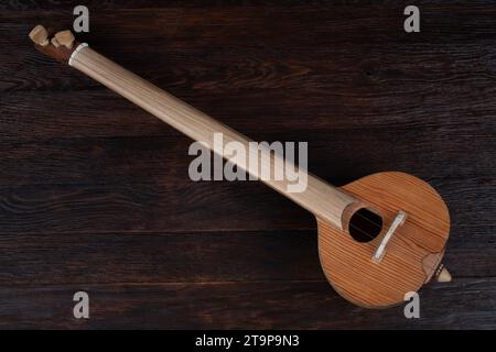 Turkish tambour. Long-necked folk string instrument of the lute family ...