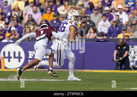 LSU tight end Mason Taylor (86) carries the ball after a reception ...