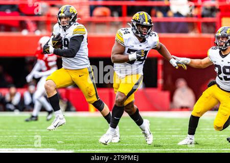 Iowa linebacker Jay Higgins runs a drill at the NFL football scouting ...