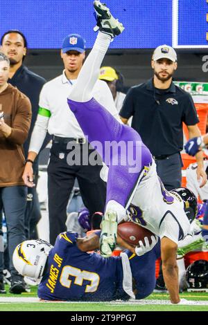 Baltimore Ravens tight end Isaiah Likely catches a touchdown pass as ...